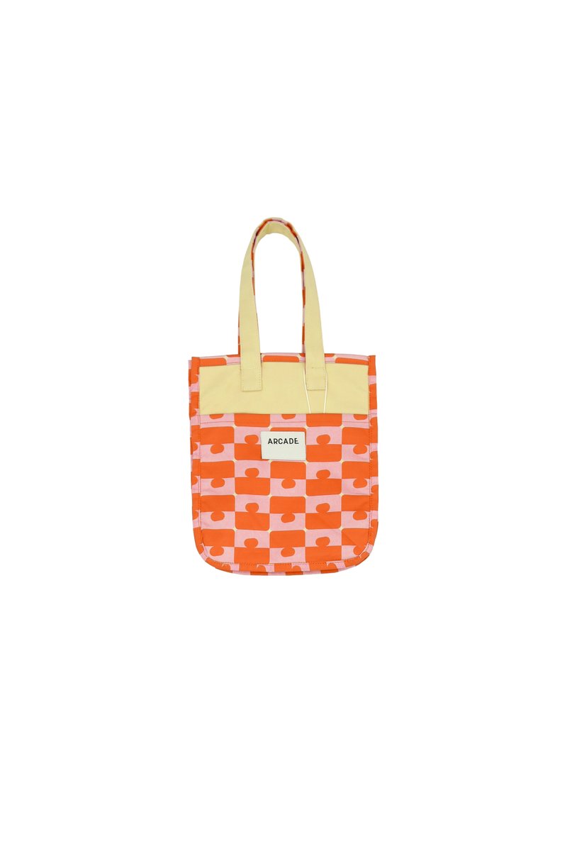 ARCADE "JIGGY" MINI TWO-WAY REVERSIBLE CARRYALL BAG IN ORANGE/PINK